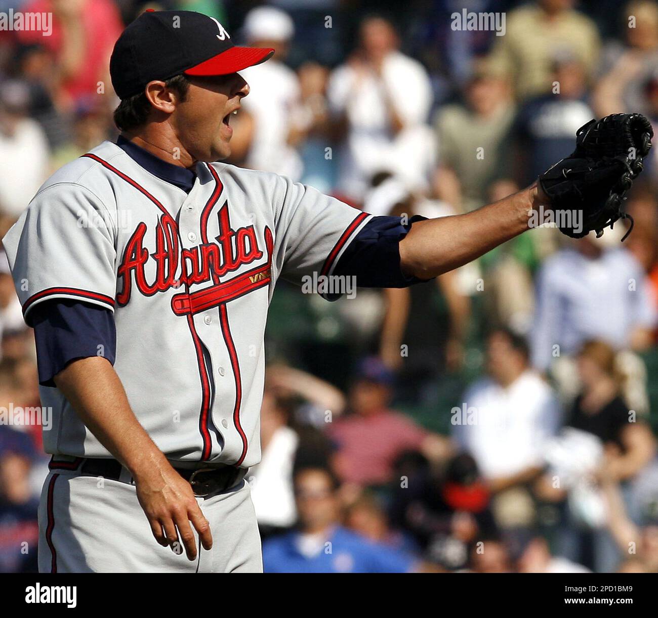 Atlanta Braves pitcher Ken Ray celebrates after the Braves beat the ...