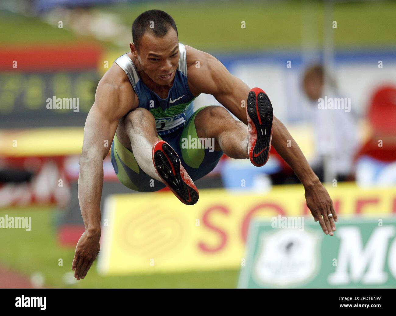 U.S. athlete Bryan Clay competes in the men's decathlon long jump event ...