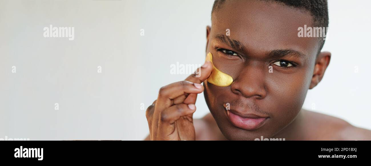 Collagen patches skin treatment man face under eye Stock Photo - Alamy
