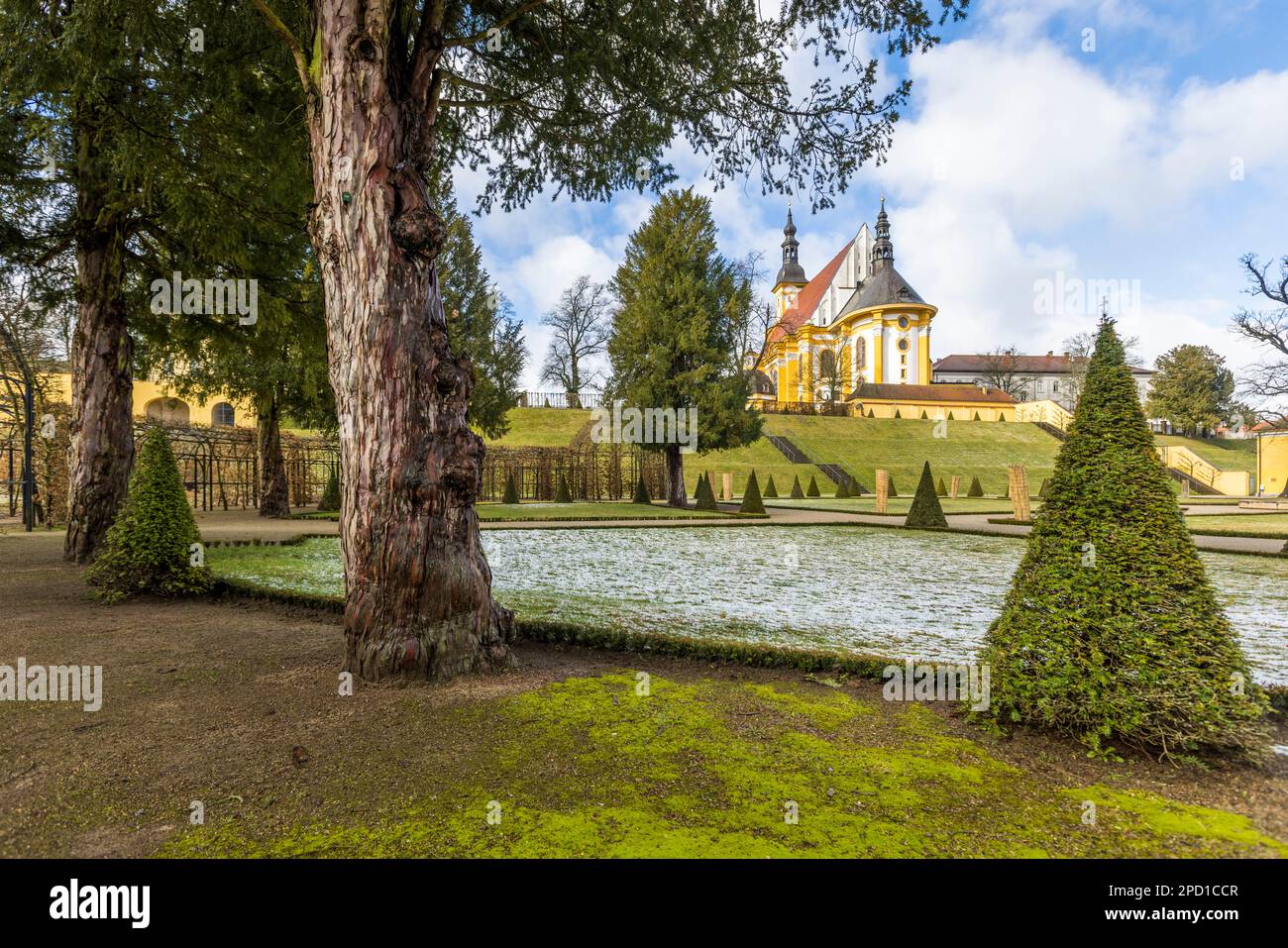 View from the monastery garden with old and newly planted yews to the ...