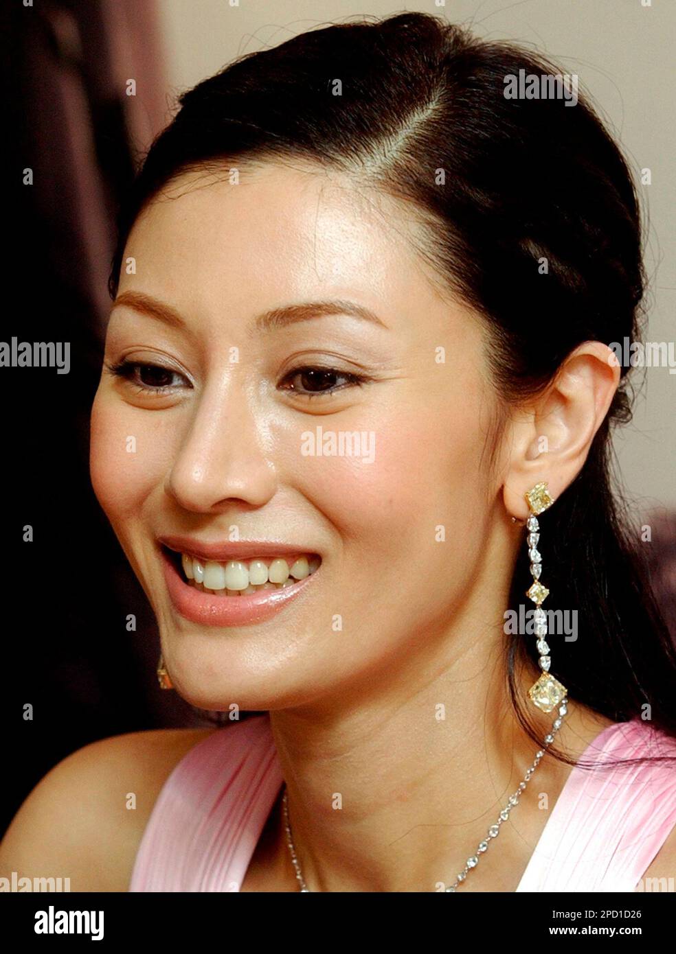 Hong Kong model-actress Michelle Reis poses during a promotional event ...