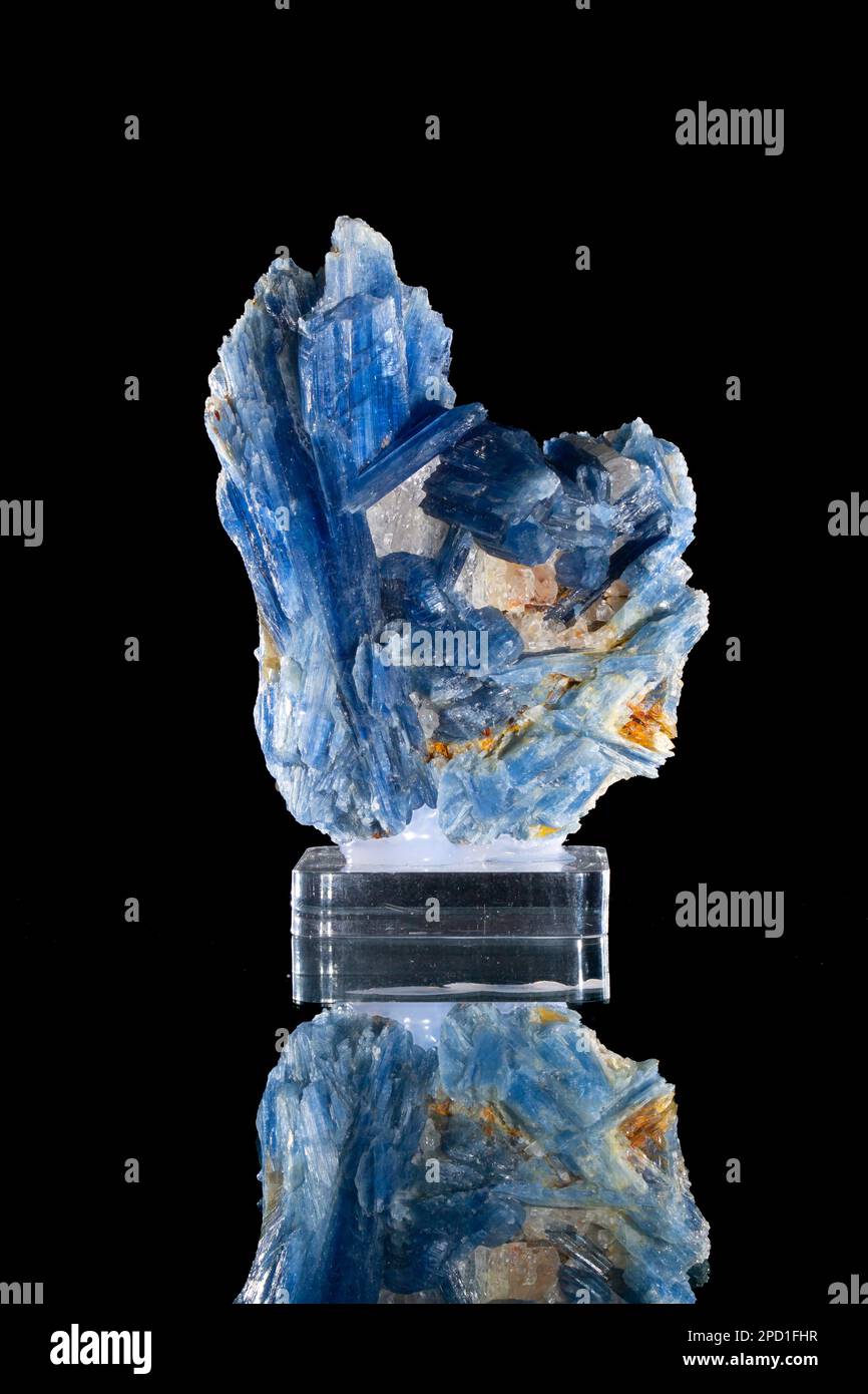 Kyanit beautiful precious stone on a black and bright background with ...