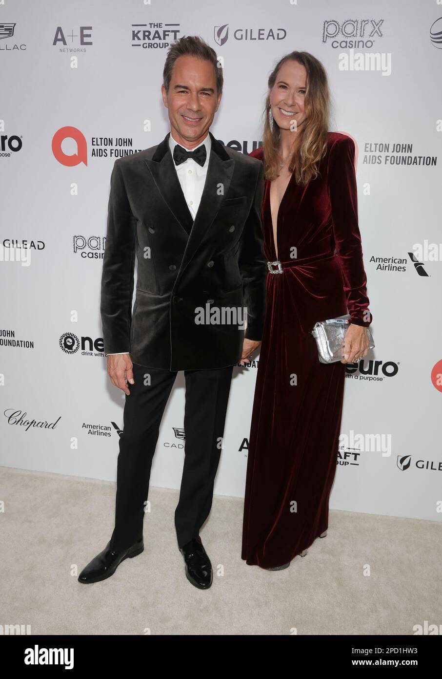 West Hollywood, Ca. 12th Mar, 2023. Eric McCormack and Janet Holden at the Elton John AIDS ...