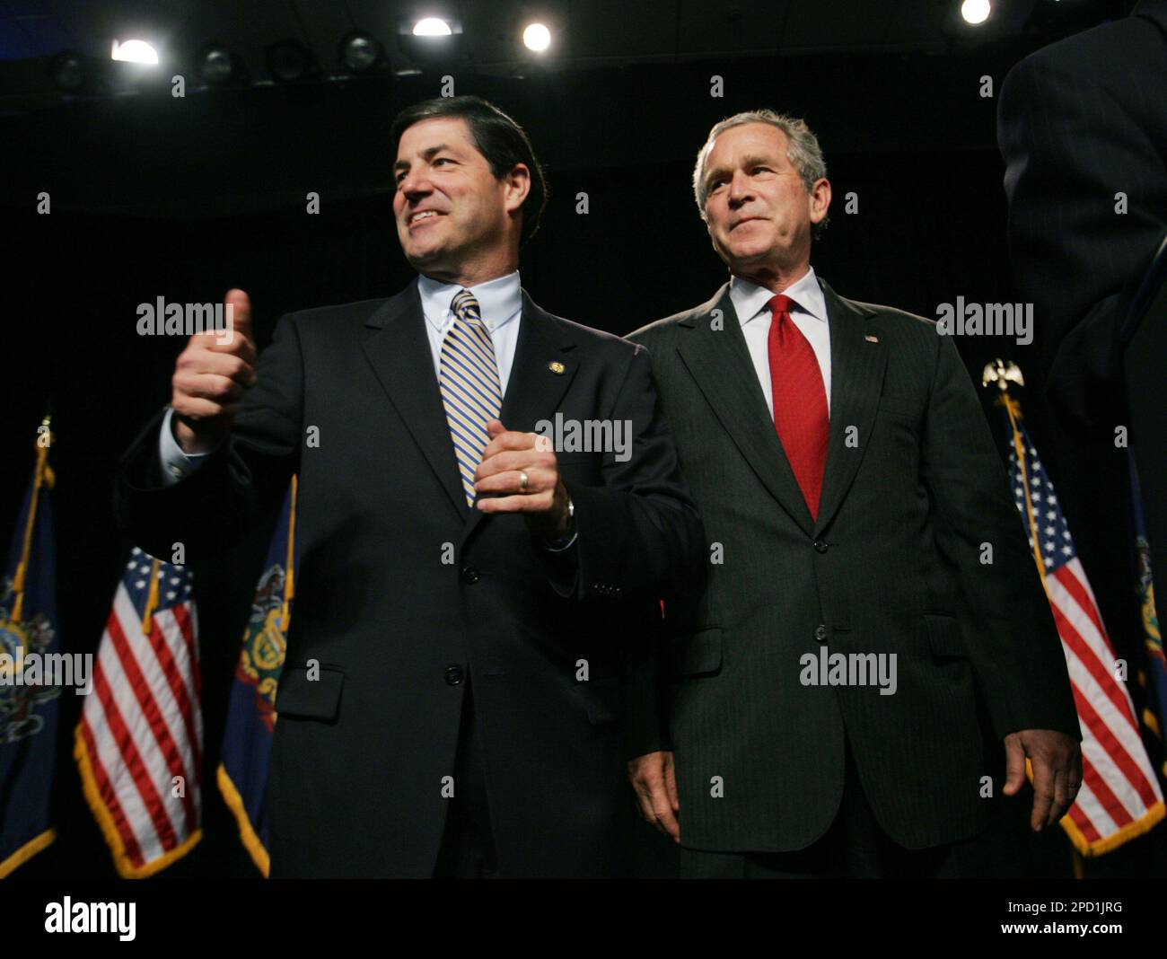 President Bush, right, stands with Rep. Jim Gerlach, R-Pa., left ...