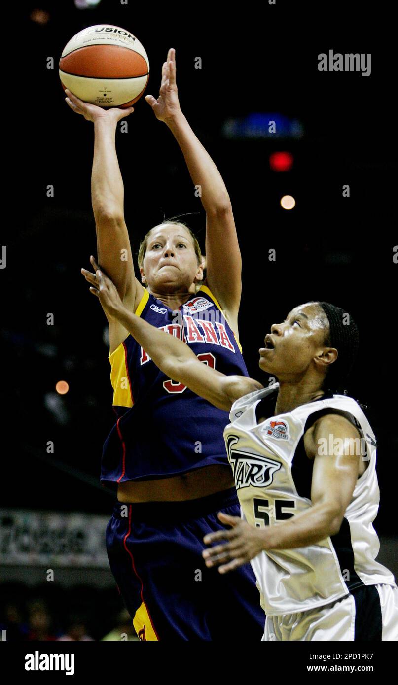 Indiana Fever guard Anna DeForge (30) is defended by San Antonio Silver ...