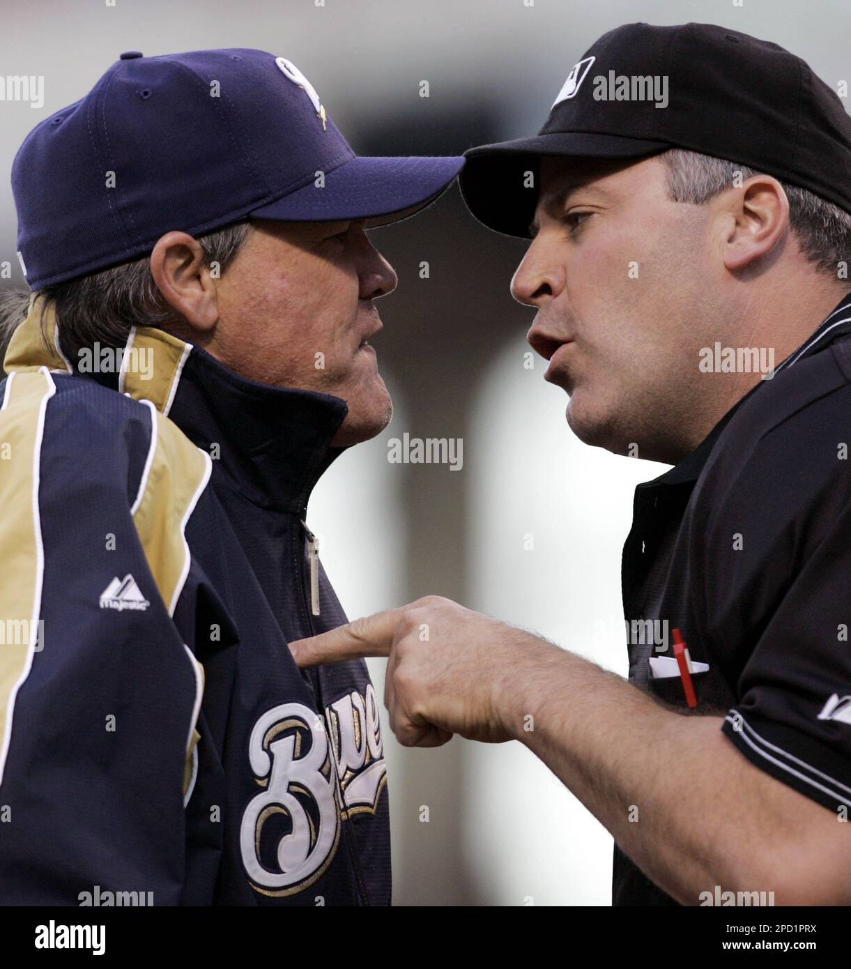Milwaukee Brewers manager Ned Yost, left, argues with home plate umpire ...
