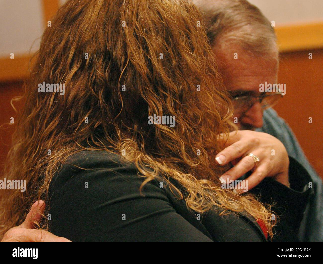 Ashley Koester, left, widow of Lake County sheriff's deputy Wayne ...