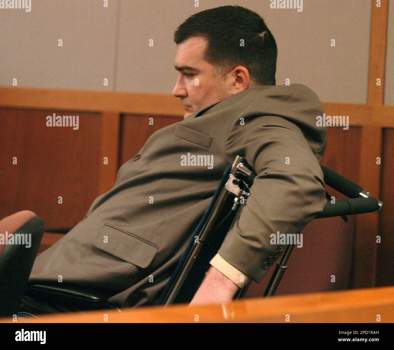 Defendant Jason Wheeler slouches in his wheelchair after declining to ...