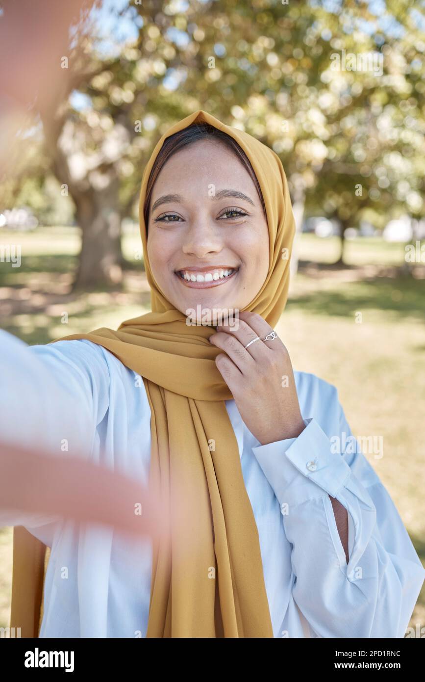 Muslim, woman in park with hijab and selfie, freedom and travel, nature ...