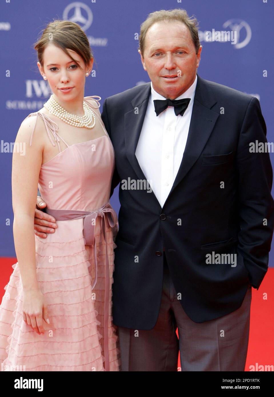 Former motor racing driver Jochen Mass arrives with his daughter ...