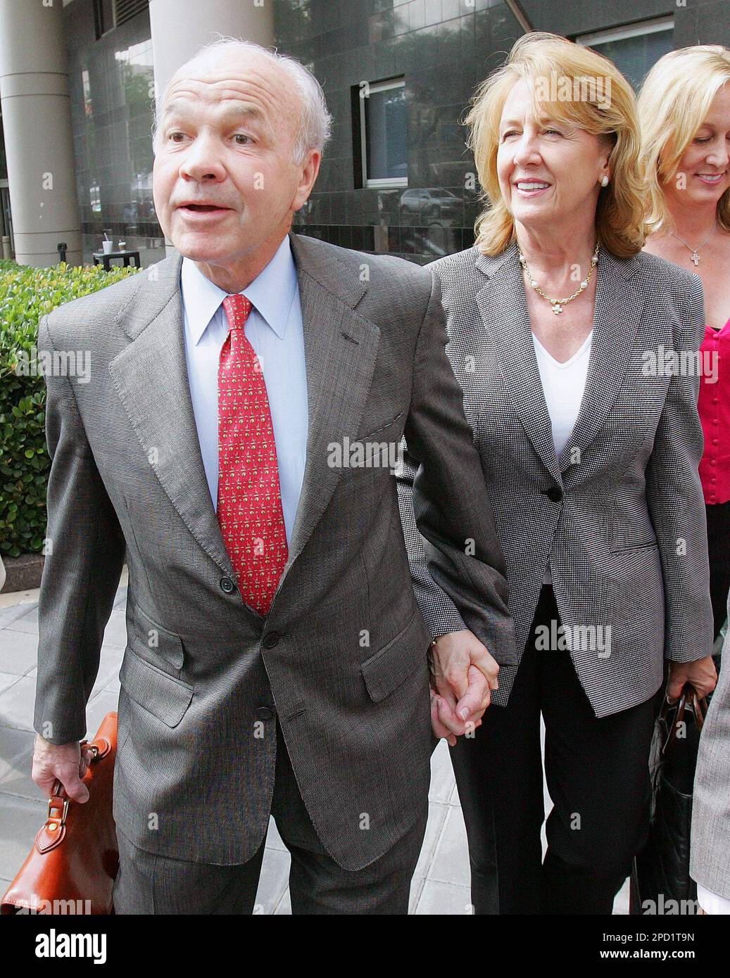 Enron Corp. founder Kenneth Lay, left, and his wife, Linda, leave the ...