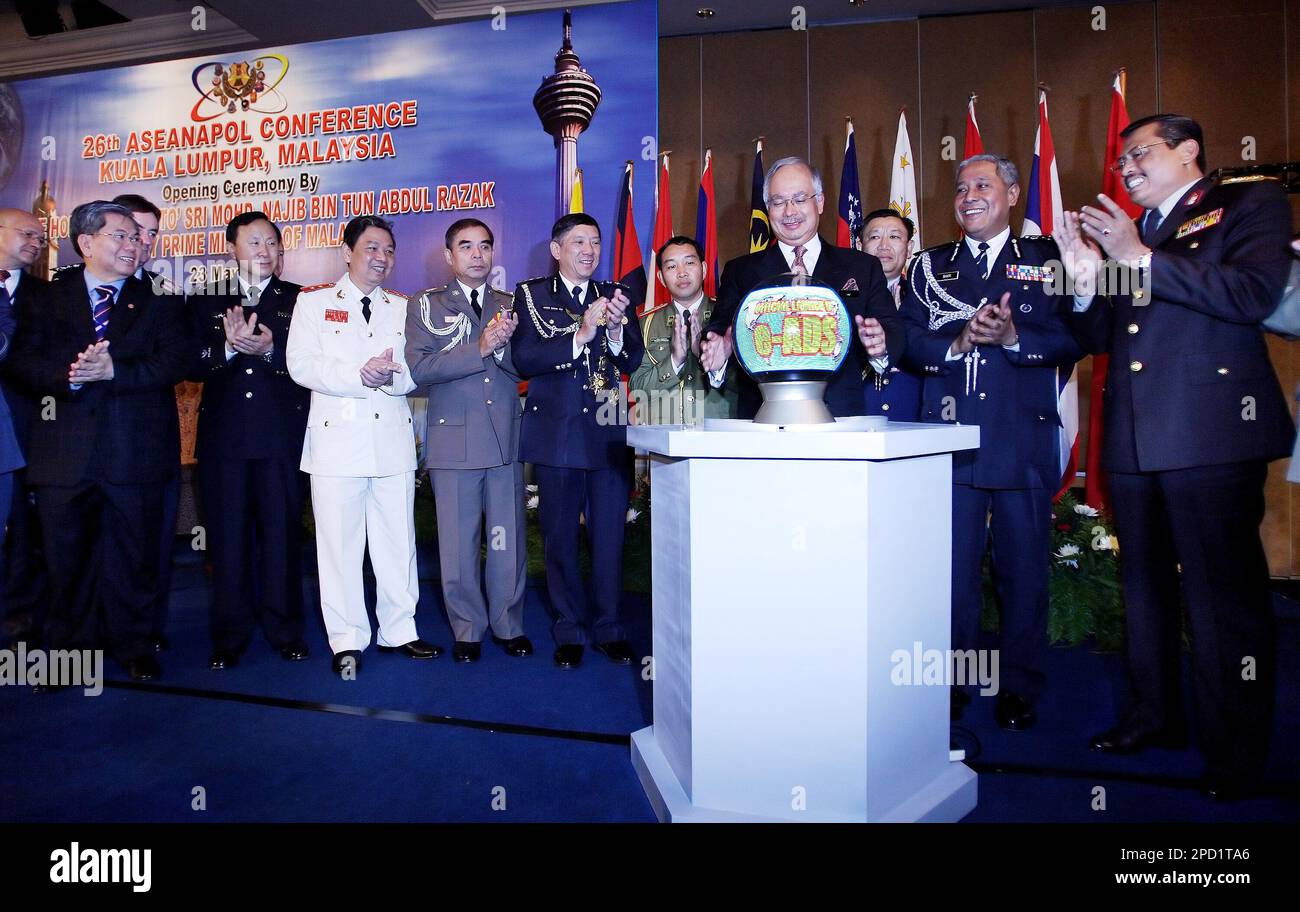 Malaysia Deputy Prime Minister Najib Tun Razak, center, official launch ...