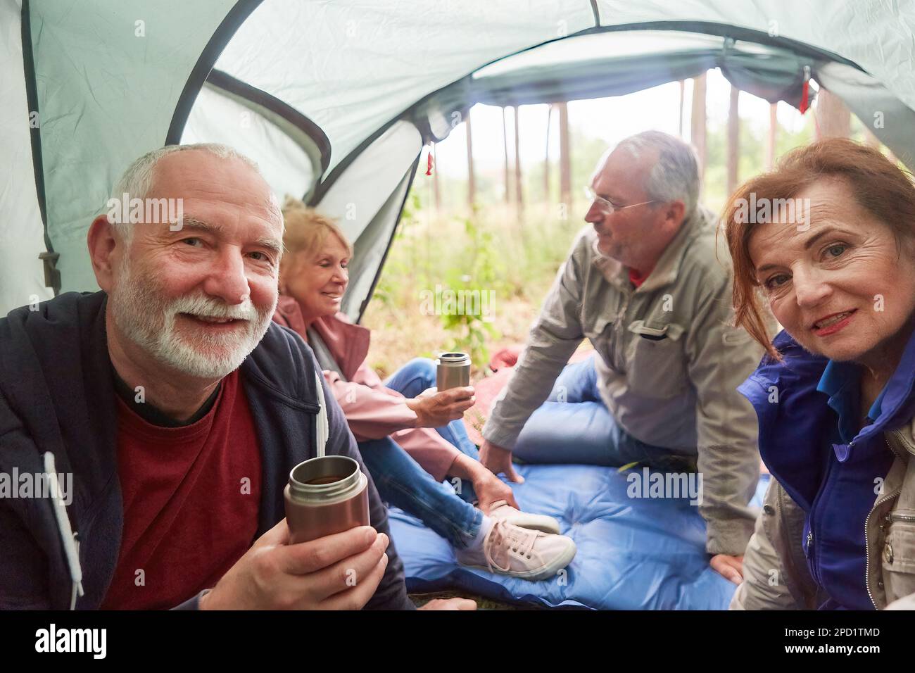 Portrait of friends in tent hi-res stock photography and images - Alamy