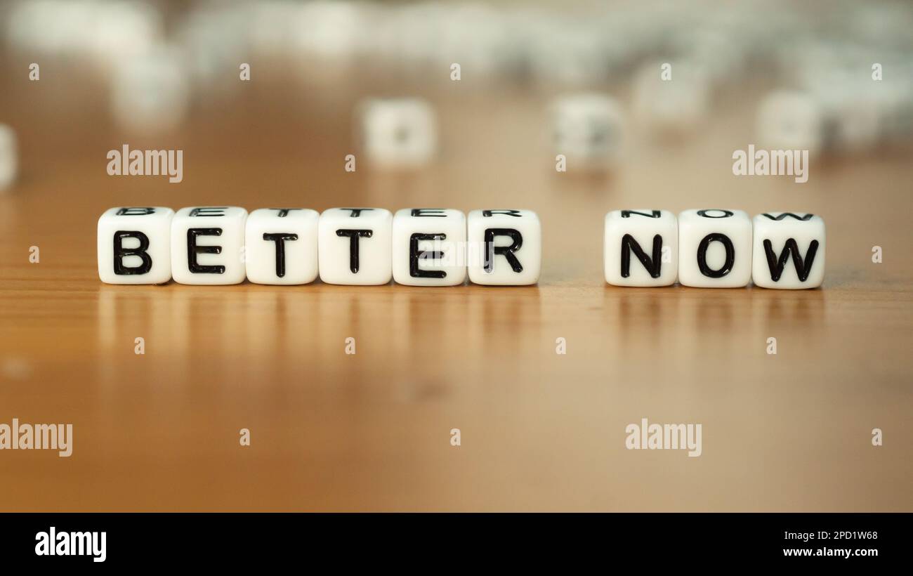Better now slogan in white block letter beads Stock Photo - Alamy