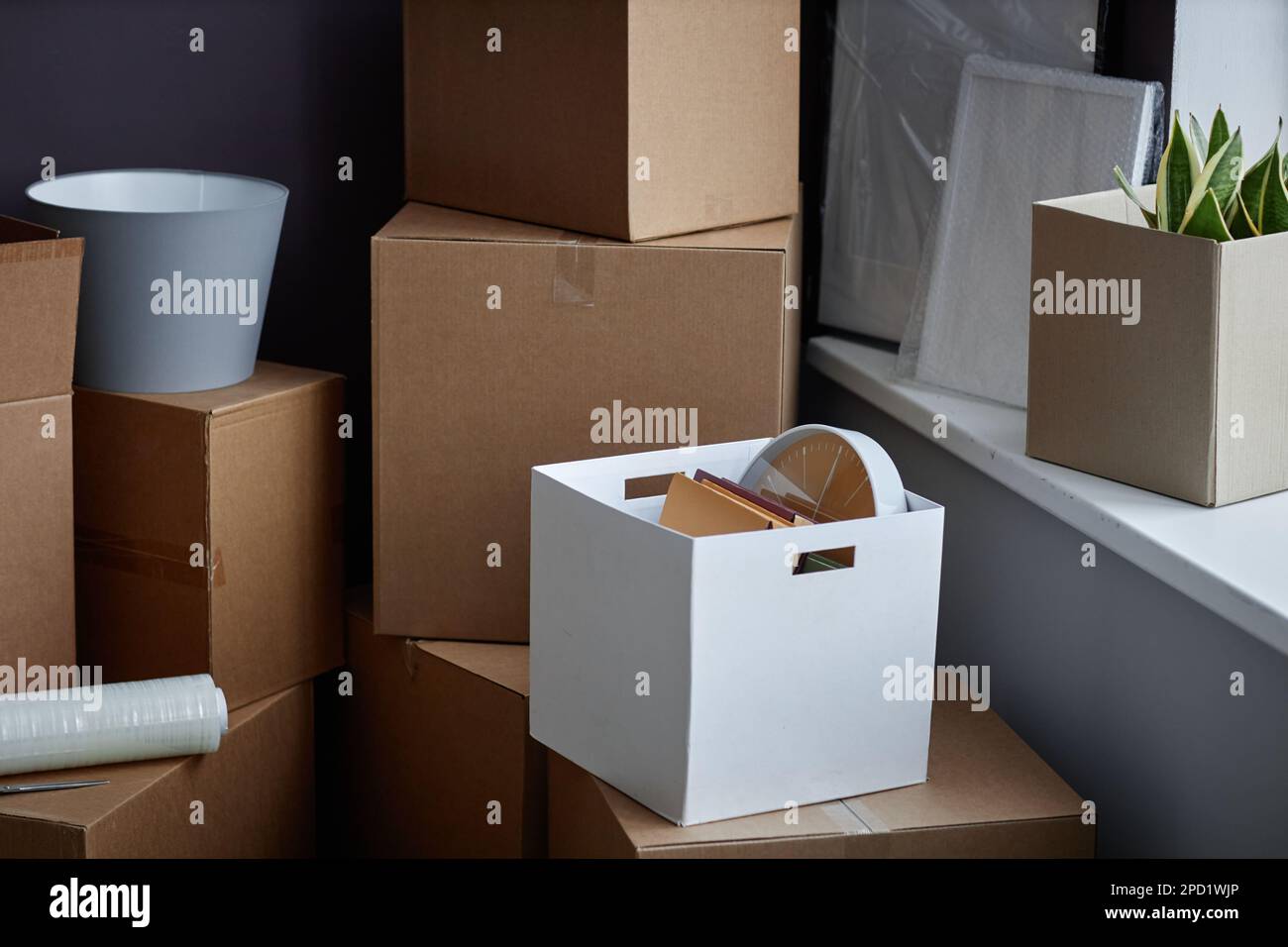 Domestic things packing in container and cardboard boxes for relocation ...