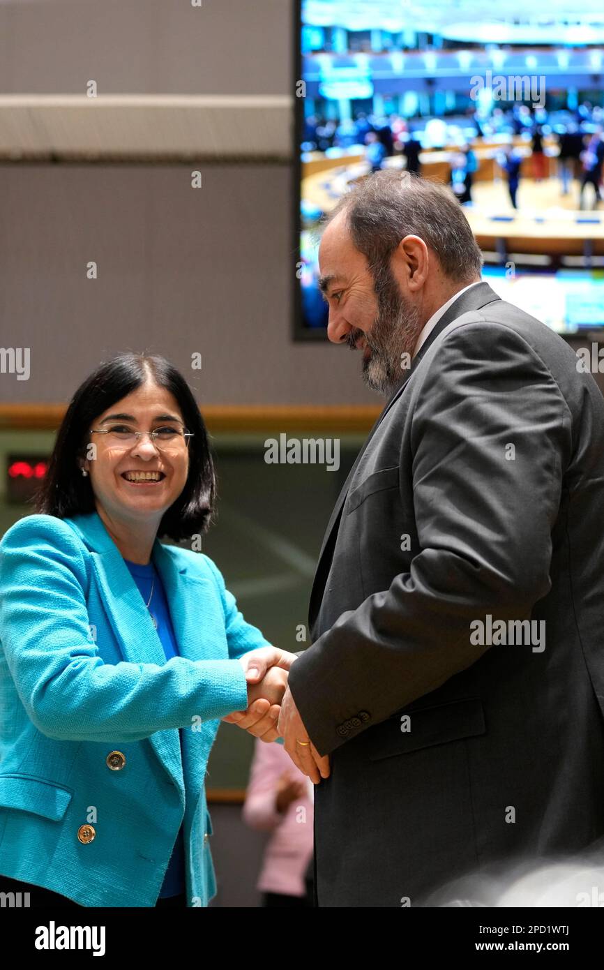 Spain's Health Minister Carolina Darias, left, speaks with French ...