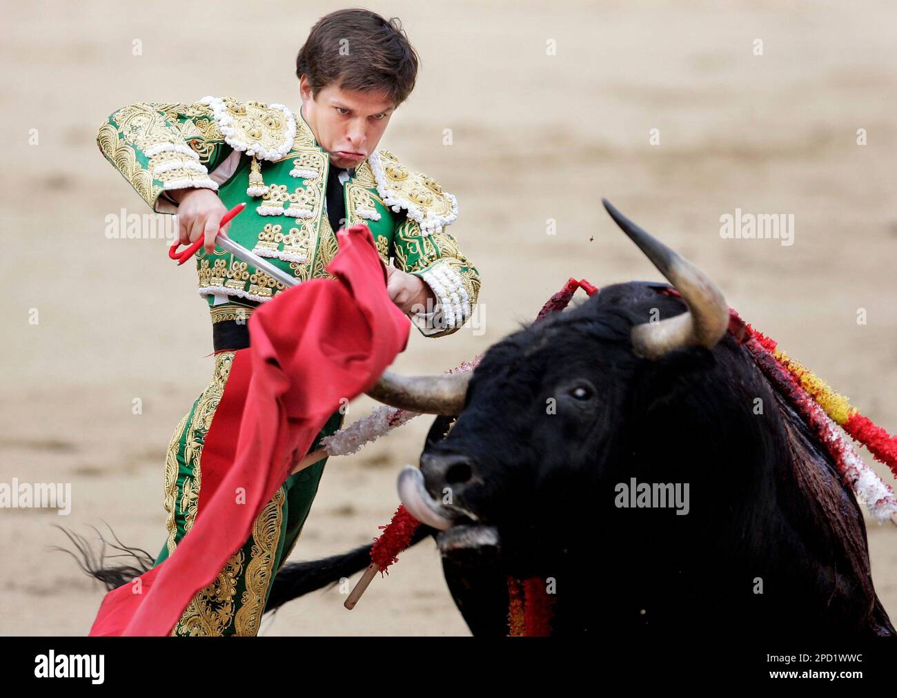 Spanish bullfighter Julian Lopez 'El Juli' perfoms a pass during San ...