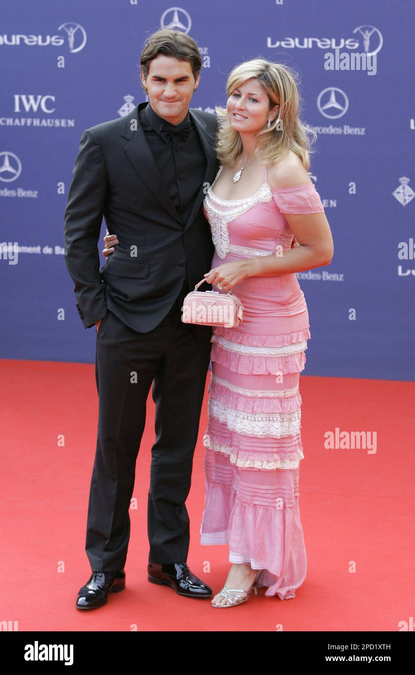 Swiss tennis player Roger Federer and his partner Mirka pose for ...