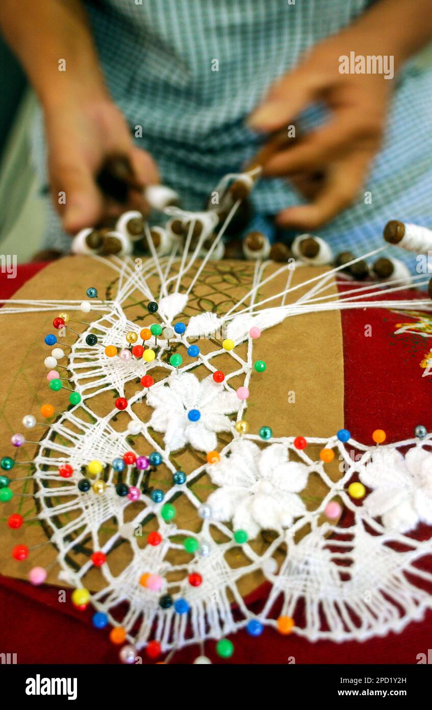 Handmade bobbin lace from northeast Brazil on August 08, 2003 ...
