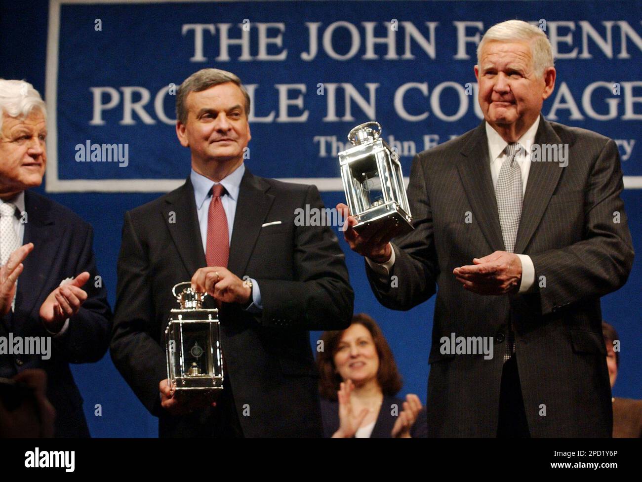 Sen. Edward Kennedy, D-Mass., left, claps after Alberto Mora, former ...