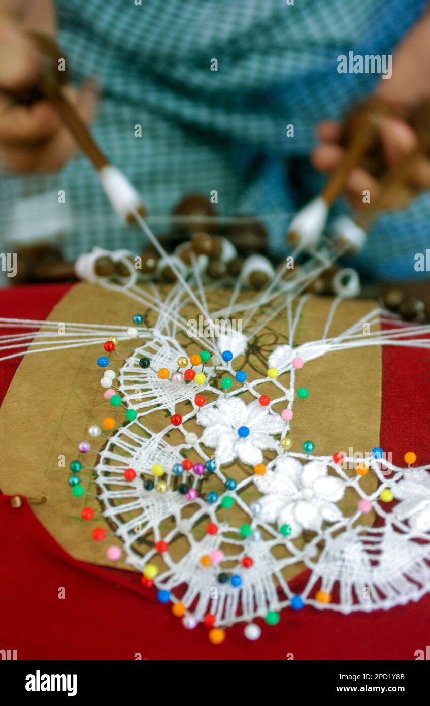 Handmade bobbin lace from northeast Brazil on August 08, 2003 ...