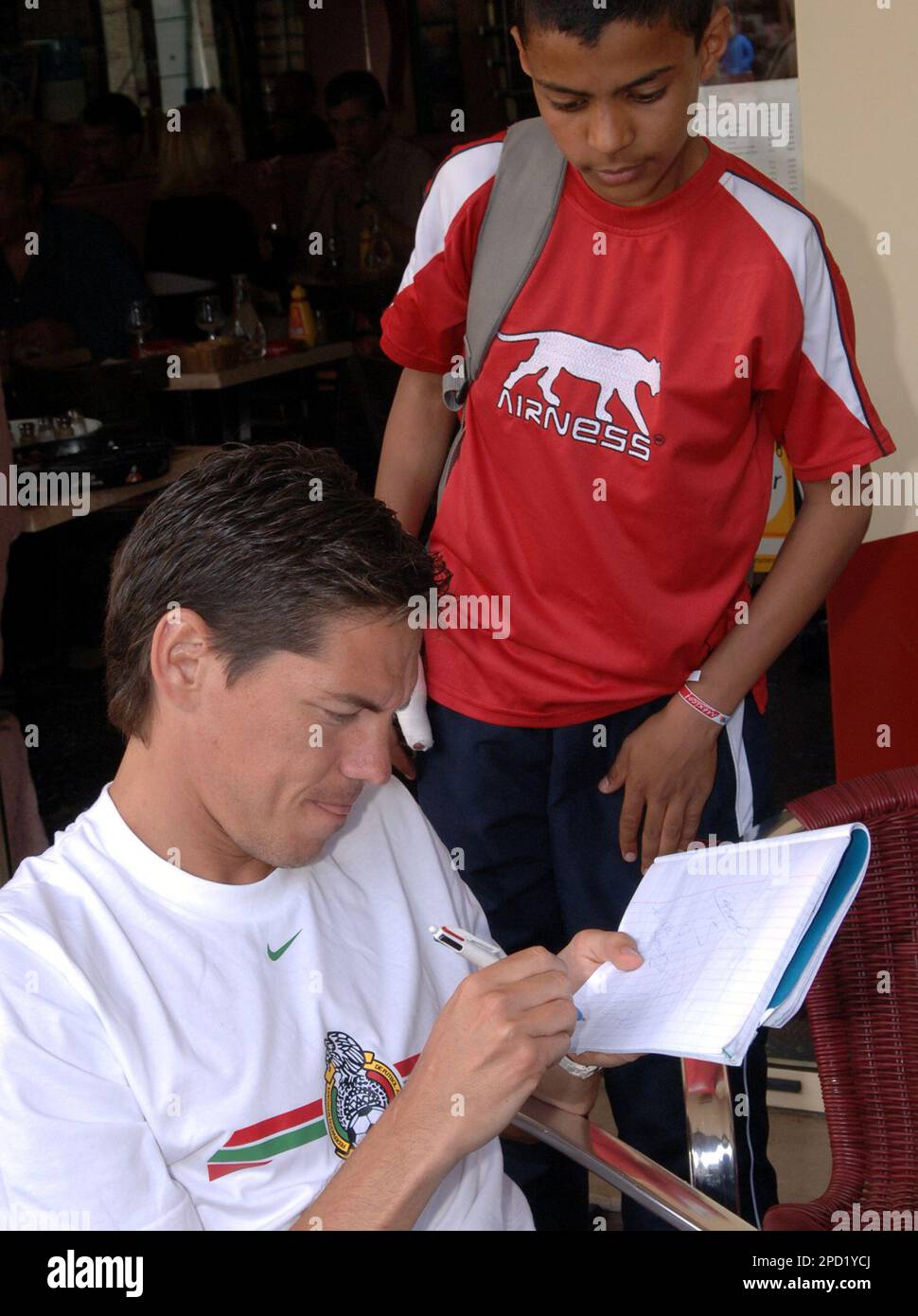 Mexican soccer player Guillermo Franco signs an authograph in Saint ...