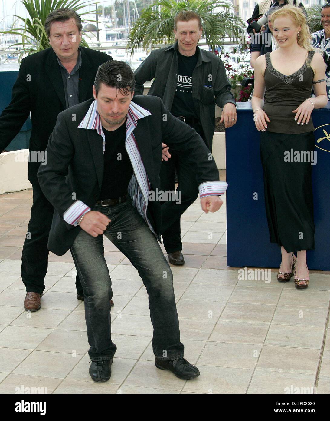 Finnish actor Janne Hyytiainen dances during a photo call for the film ...