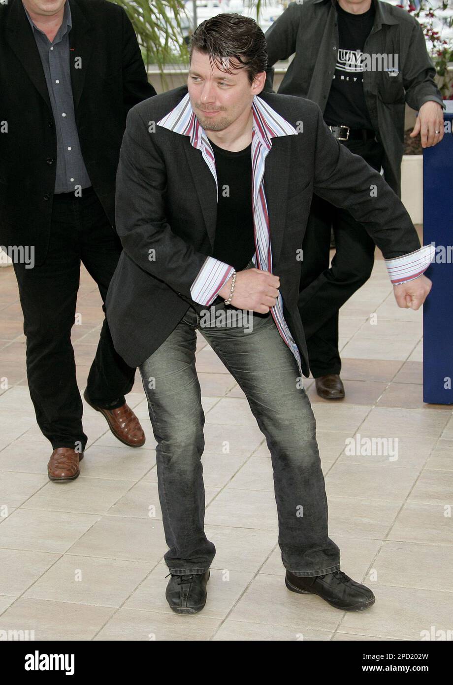 Finnish actor Janne Hyytiainen dances during a photo call for the film ...