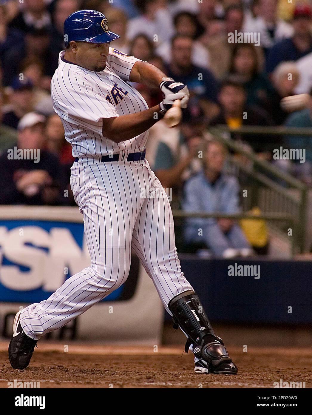 Milwaukee Brewers' Carlos Lee connects for a two run double during the ...