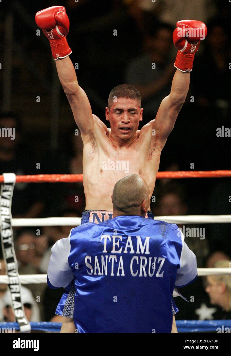 Jose Armando Santa Cruz, top, of Los Angeles, is carried around the ...