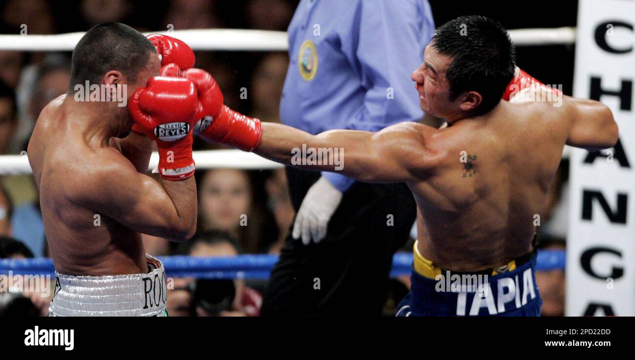Ricardo "Rocky" Juarez, left, of Houston, takes a left from Marco ...
