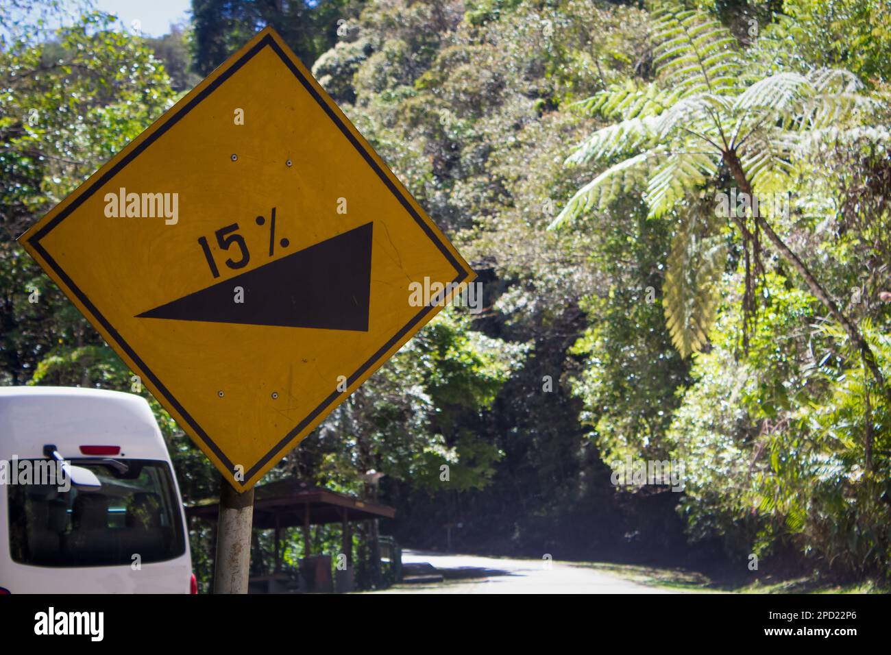 Road sign indicating moderate slope of 15 percent gradient. Moderate ... Road sign indicating moderate slope of 15 percent gradient. Moderate ...