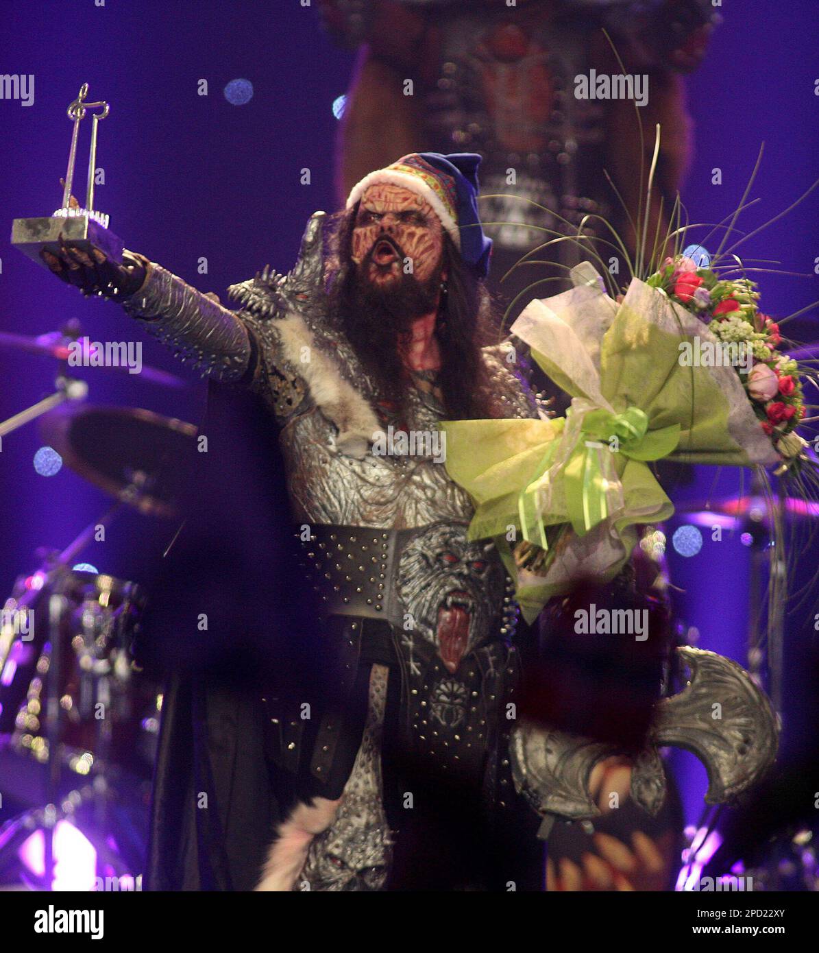 Singer of the group Lordi celebrates with the trophy after the ...