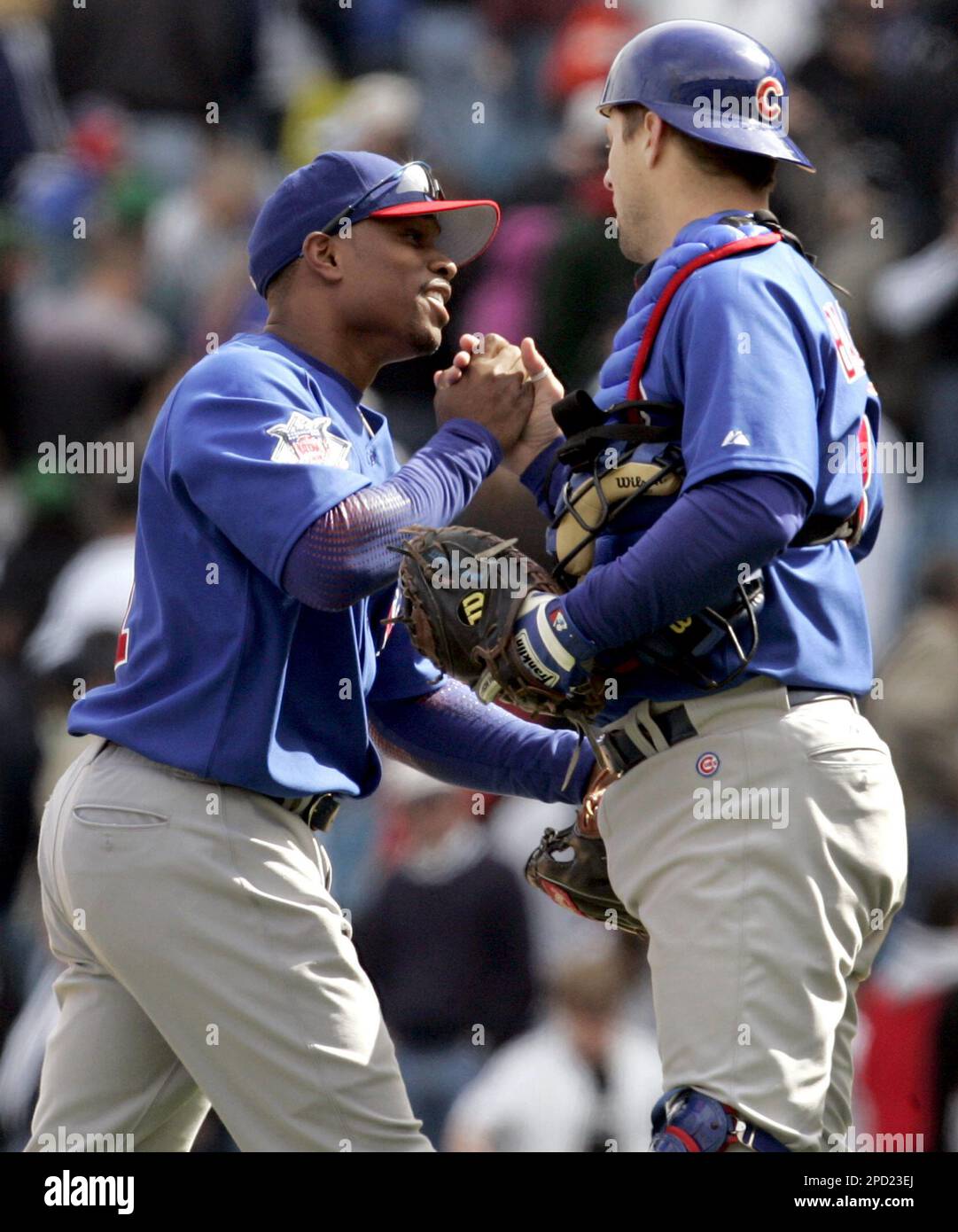 Chicago Cubs' Jacque Jones, left, celebrates with teammate Michael ...