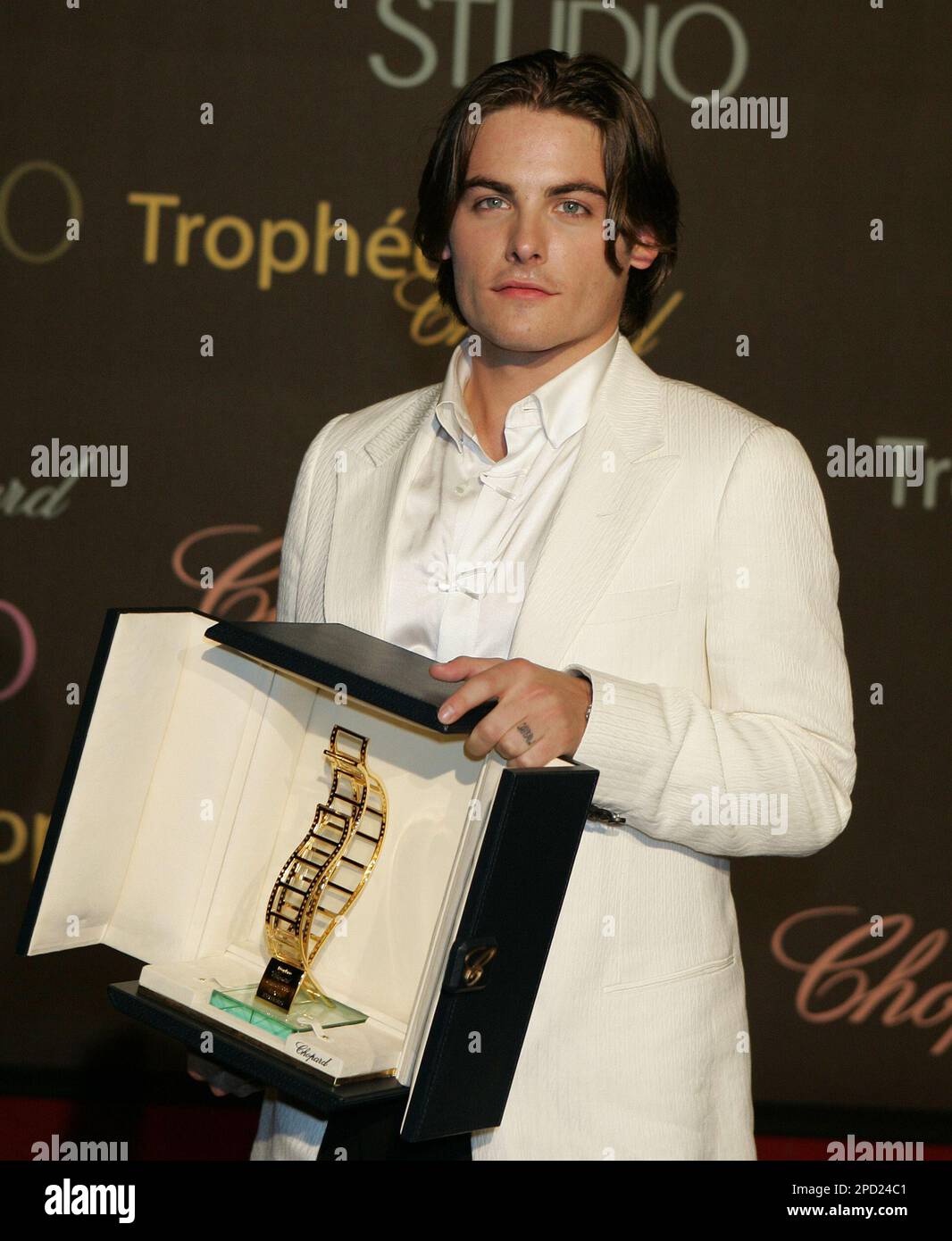 Canadian actor Kevin Zegers poses with his award at the Chopard young ...