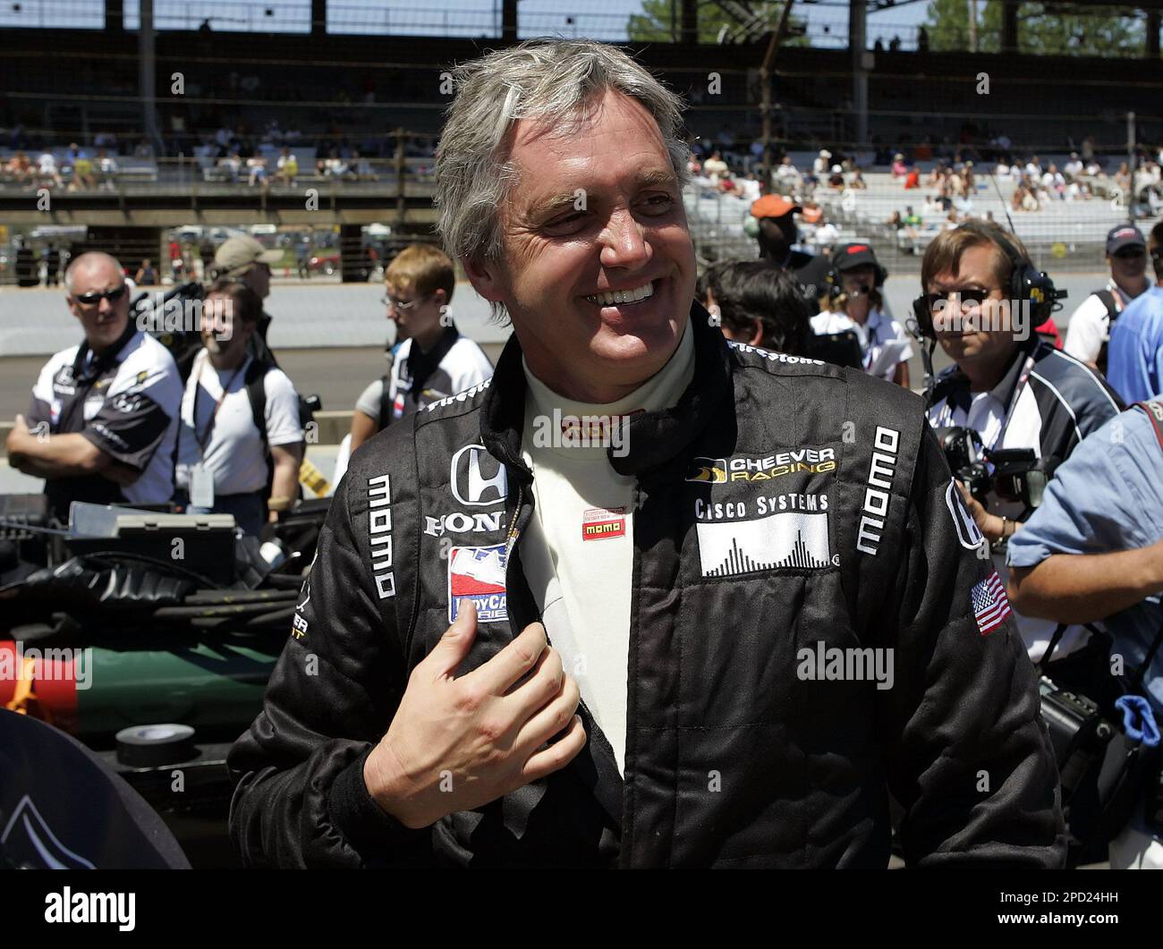 Indy Racing League driver Eddie Cheever Jr smiles after he qualified ...