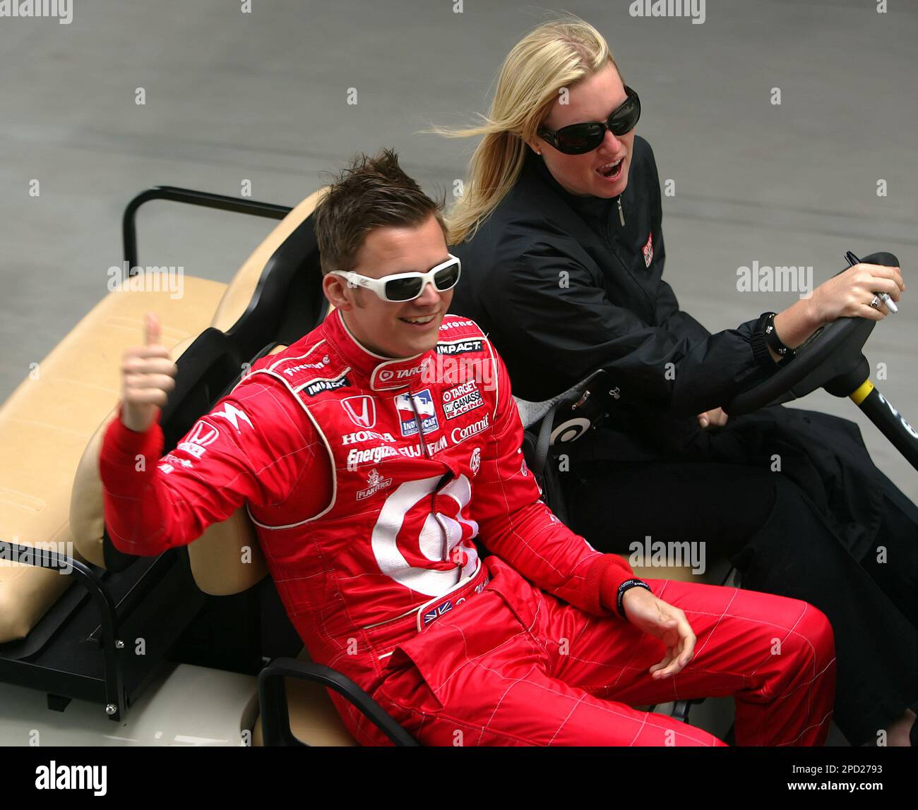 Indy Racing League driver Dan Wheldon, foreground, of Great Britain ...