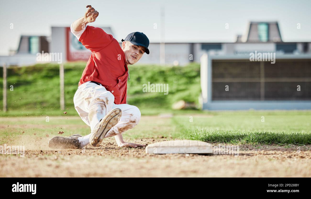 Baseball, sports and man slide on field for competition, game or ...