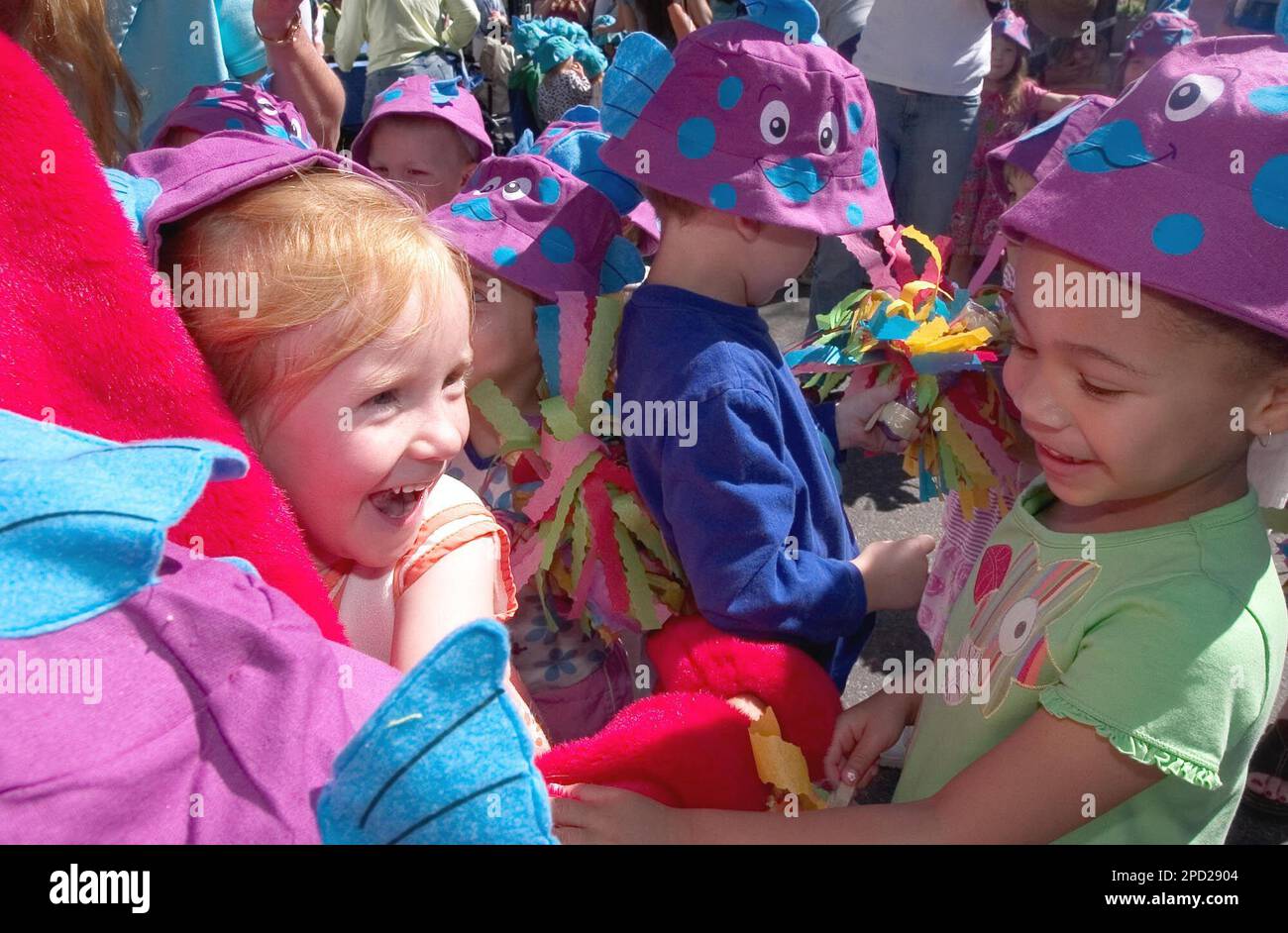 Sophia Perry, left, smiles as friend and Roaring Fork Kids pre-school ...