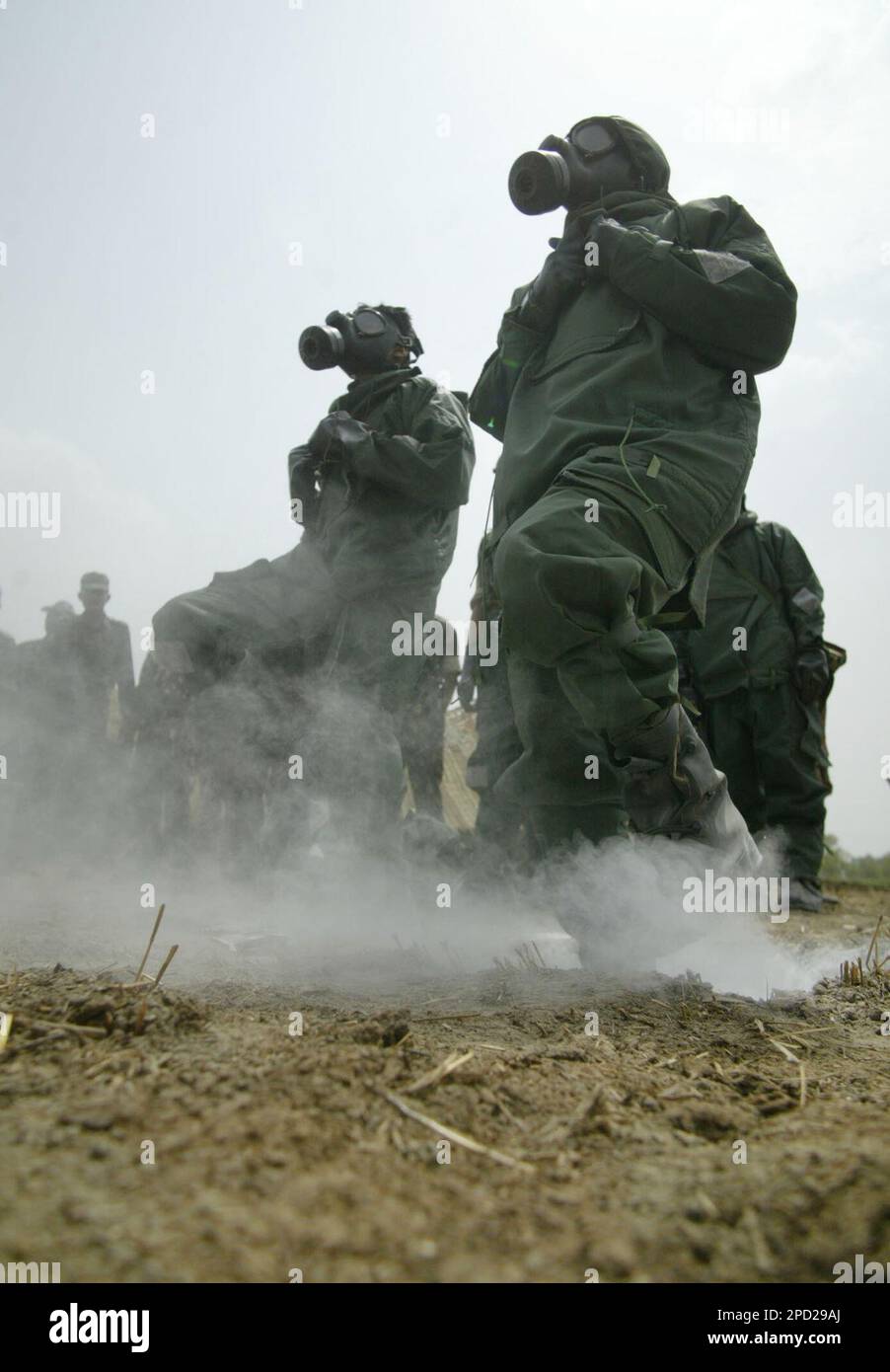 Indian Army soldiers wear protective gear to protect themselves from ...