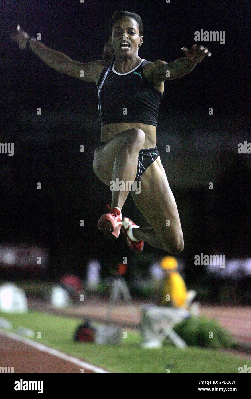 Jackie Edwards, of the Bahamas, competes in the long jump category at ...