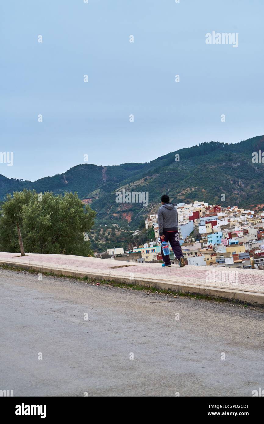 Old man walking on village hi-res stock photography and images - Alamy