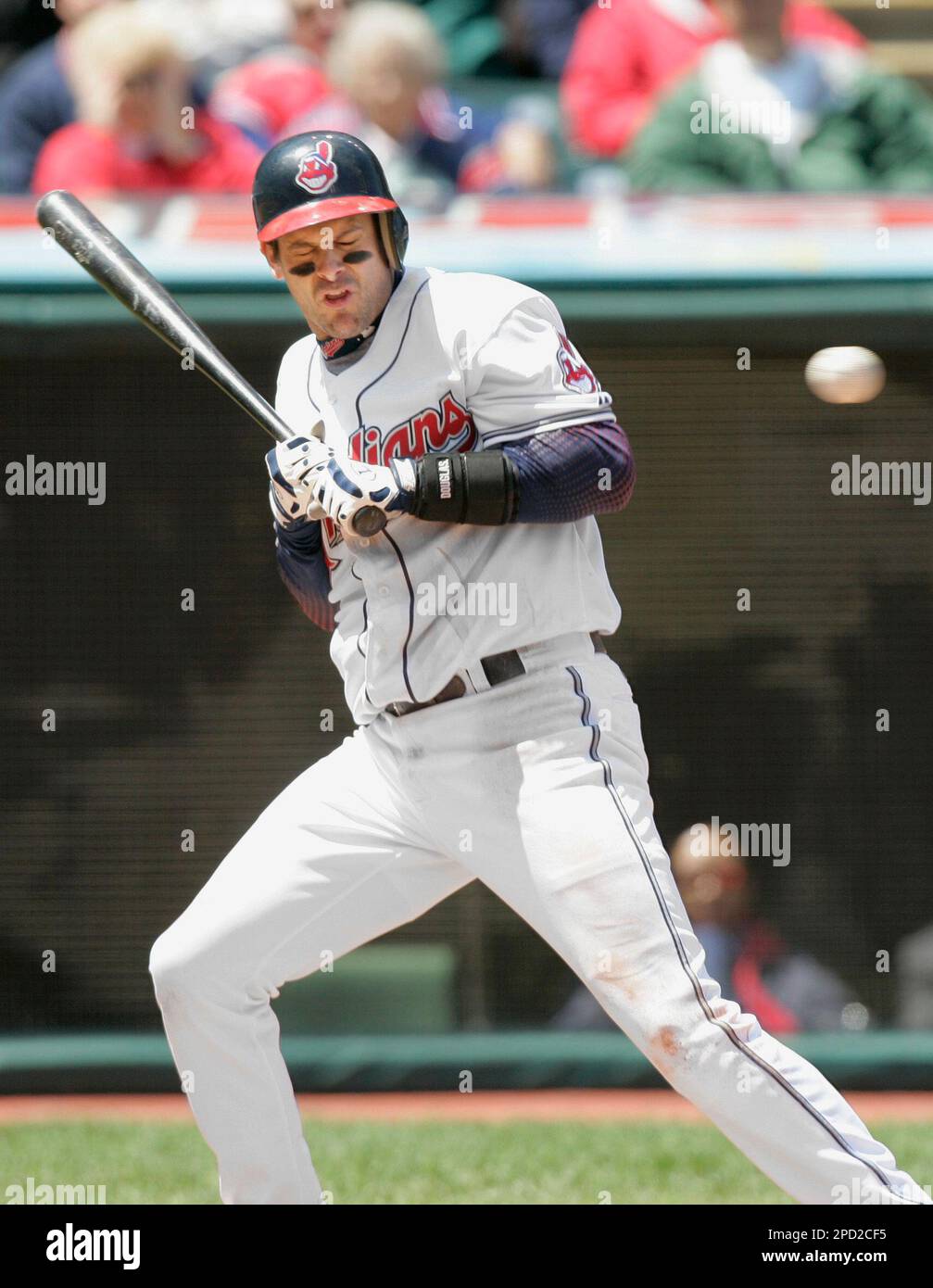 Cleveland Indians' Aaron Boone gets hit by a pitch from Kansas City ...
