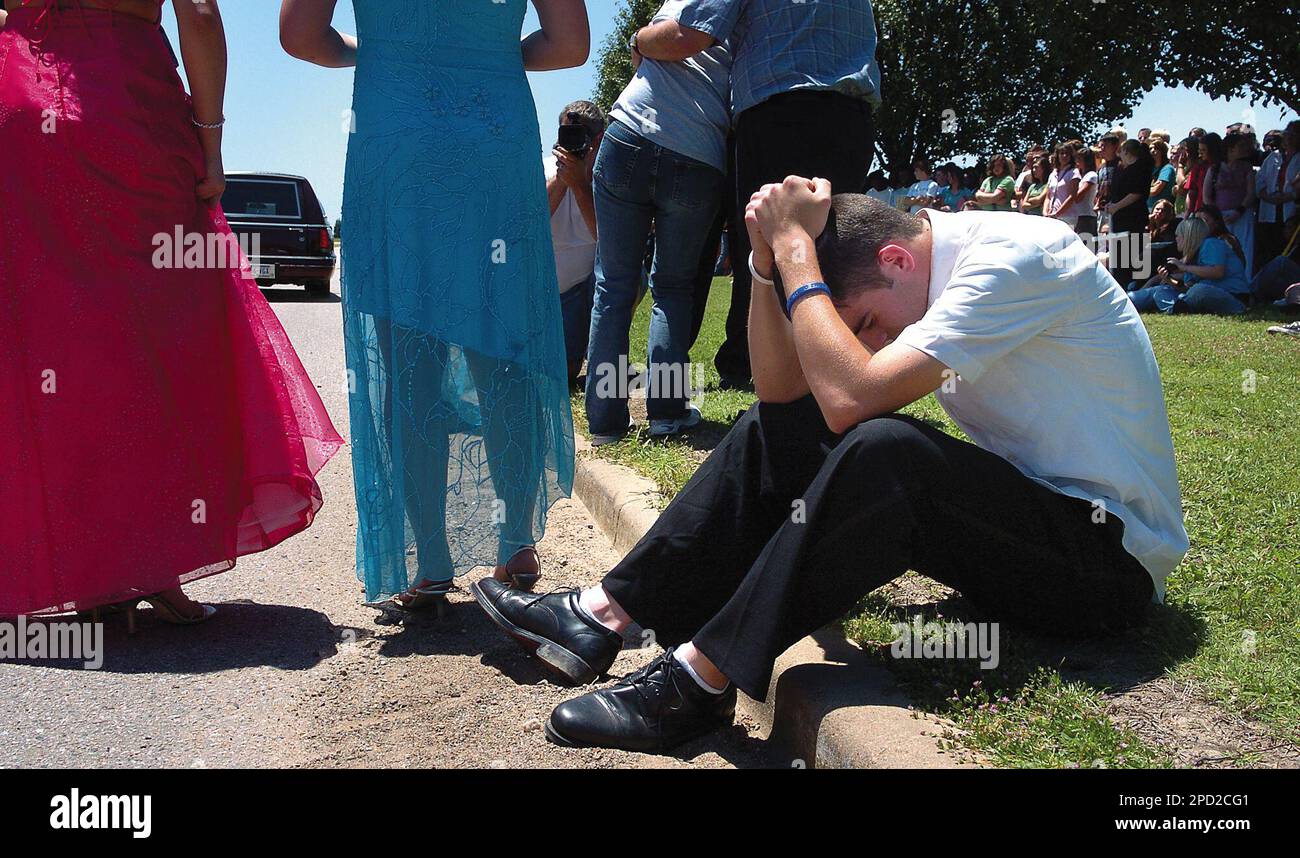 Paris High School students gather around the scene of a mock car wreck ...