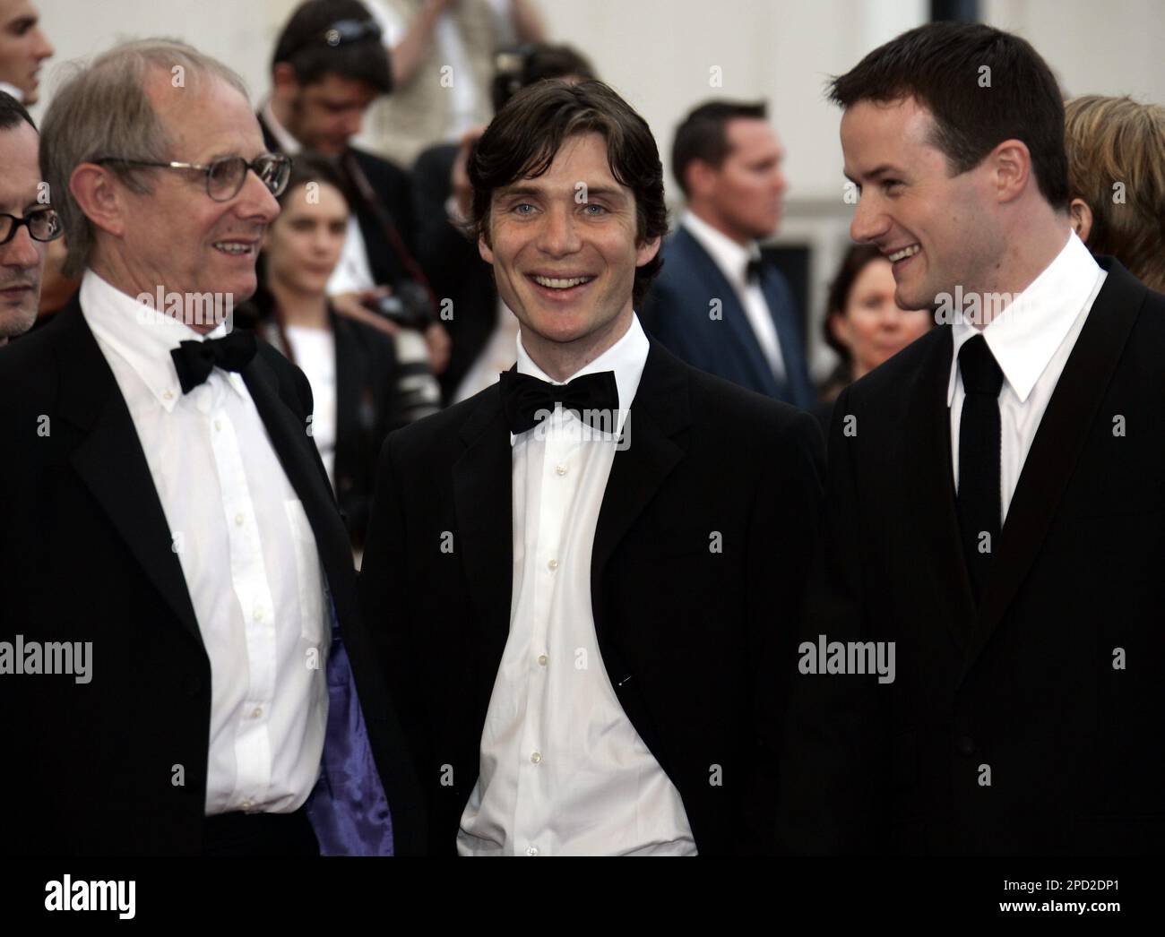 Irish actor Cillian Murphy, center, British director Ken Loach, left ...