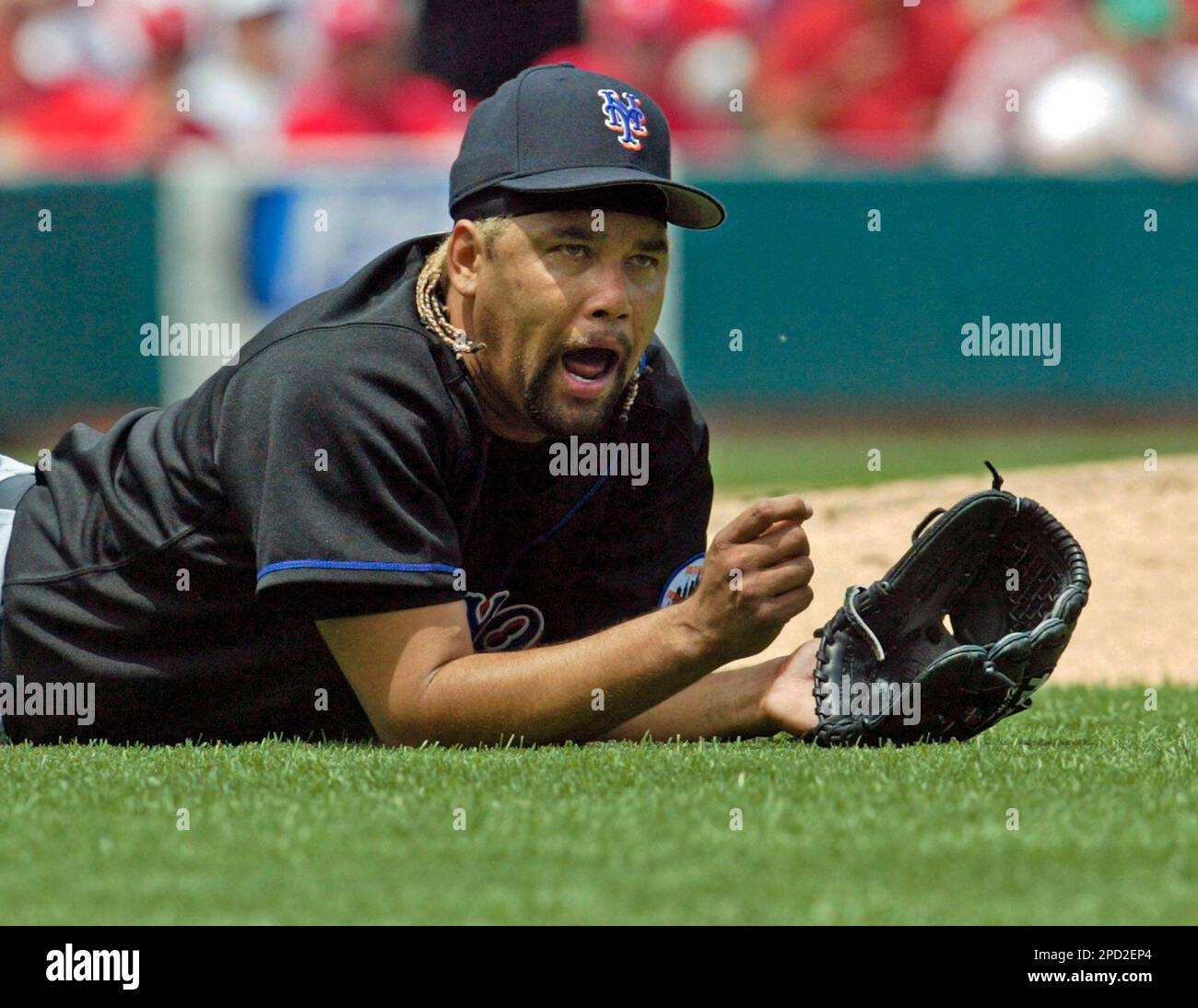 New York Mets pitcher Jose Lima celebrates after making a play from his ...