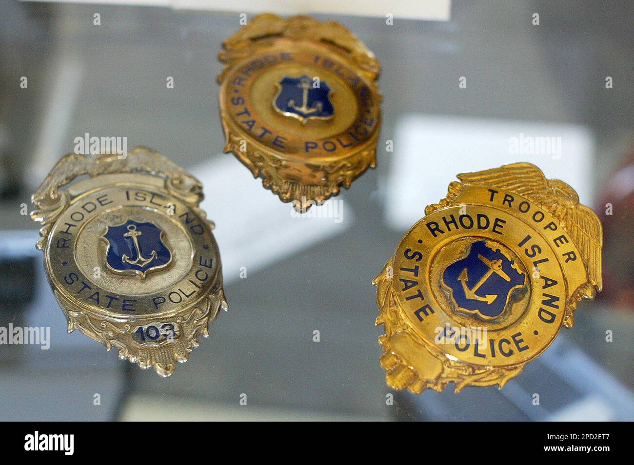 Old Rhode Island State Trooper badges are among the items on display at ...