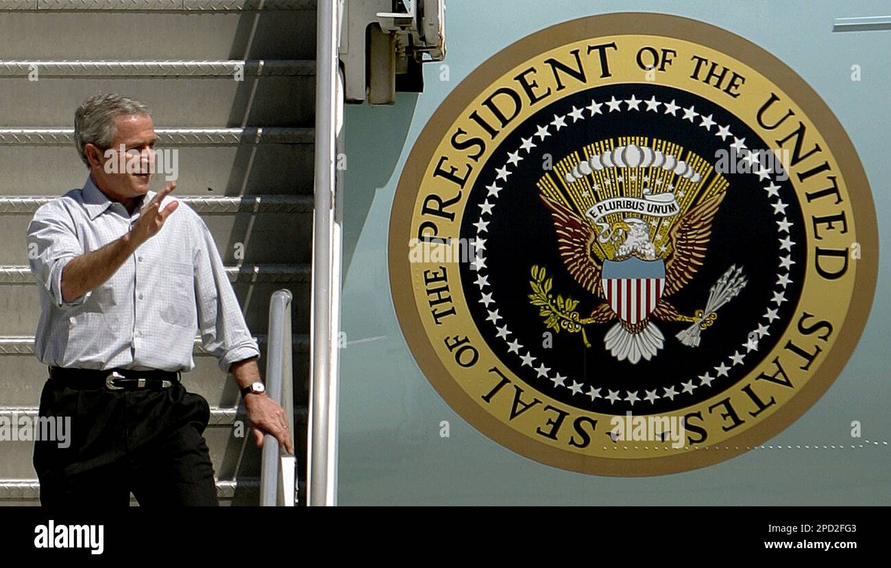 President Bush waves after arriving at Marine Corps Air Station in Yuma ...