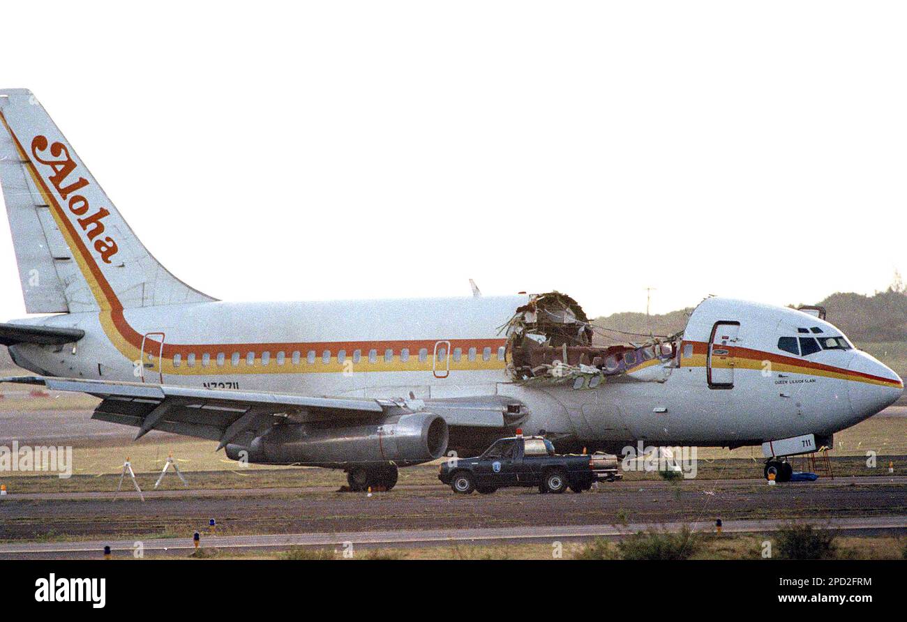 The Aloha Airlines Flight 243 sits on the runway at Kahului Airport on ...