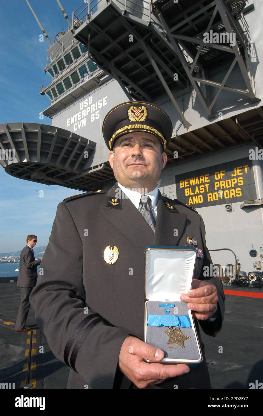 Srecko Herzeg, a descendant of WW2 hero Peter Tomich, displays the ...